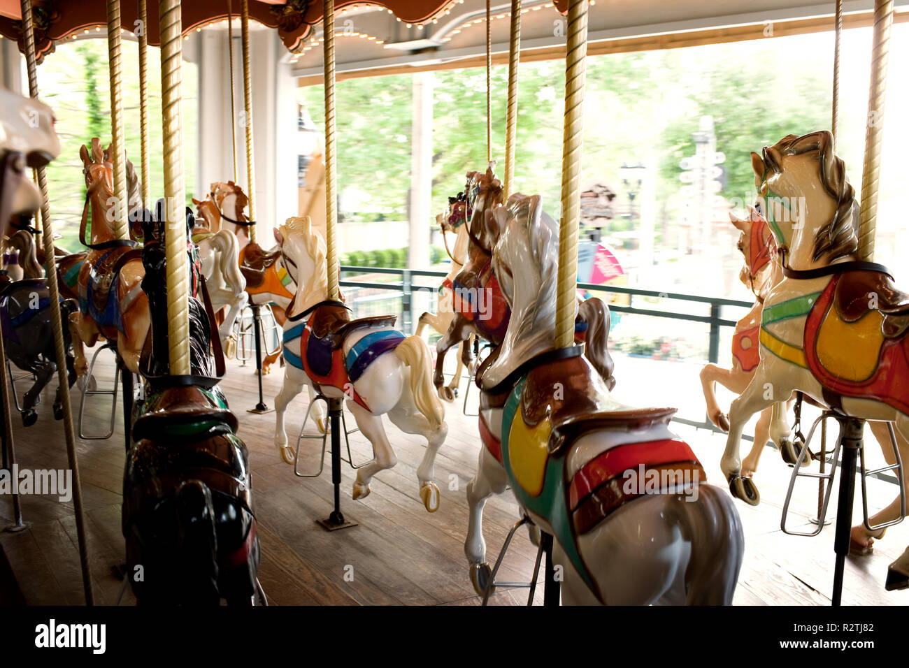 Empty carousel at an amusement park Stock Photo - Alamy