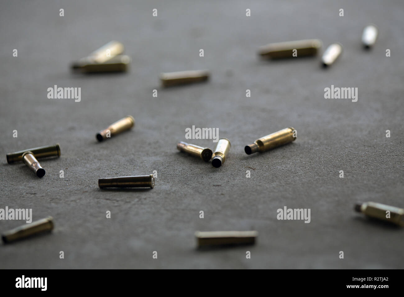 Empty bullets on the ground Stock Photo - Alamy