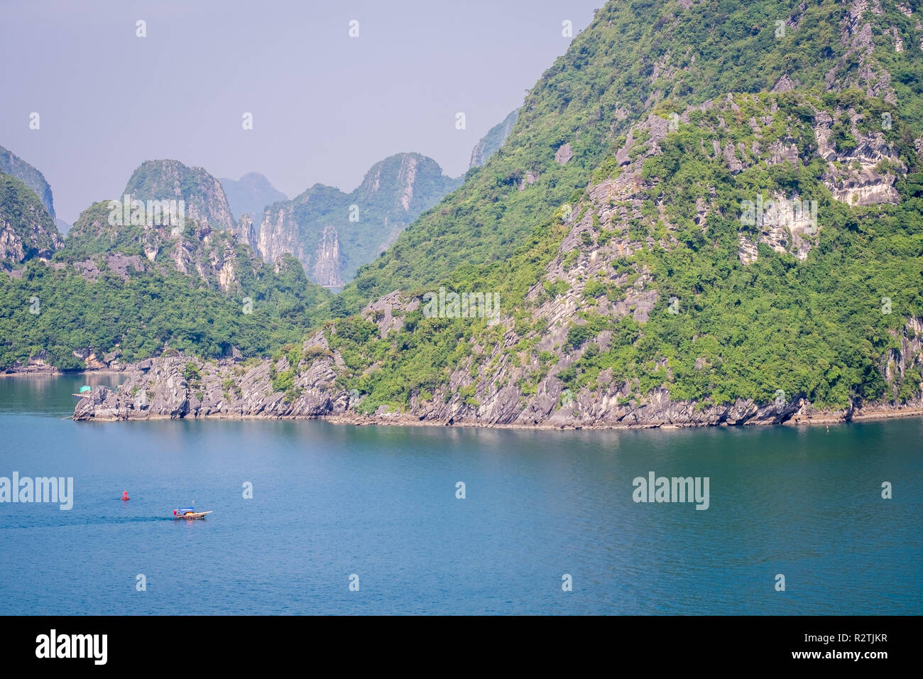 Panoramic view of Ha Long Bay in the sunset. Located in the north of ...