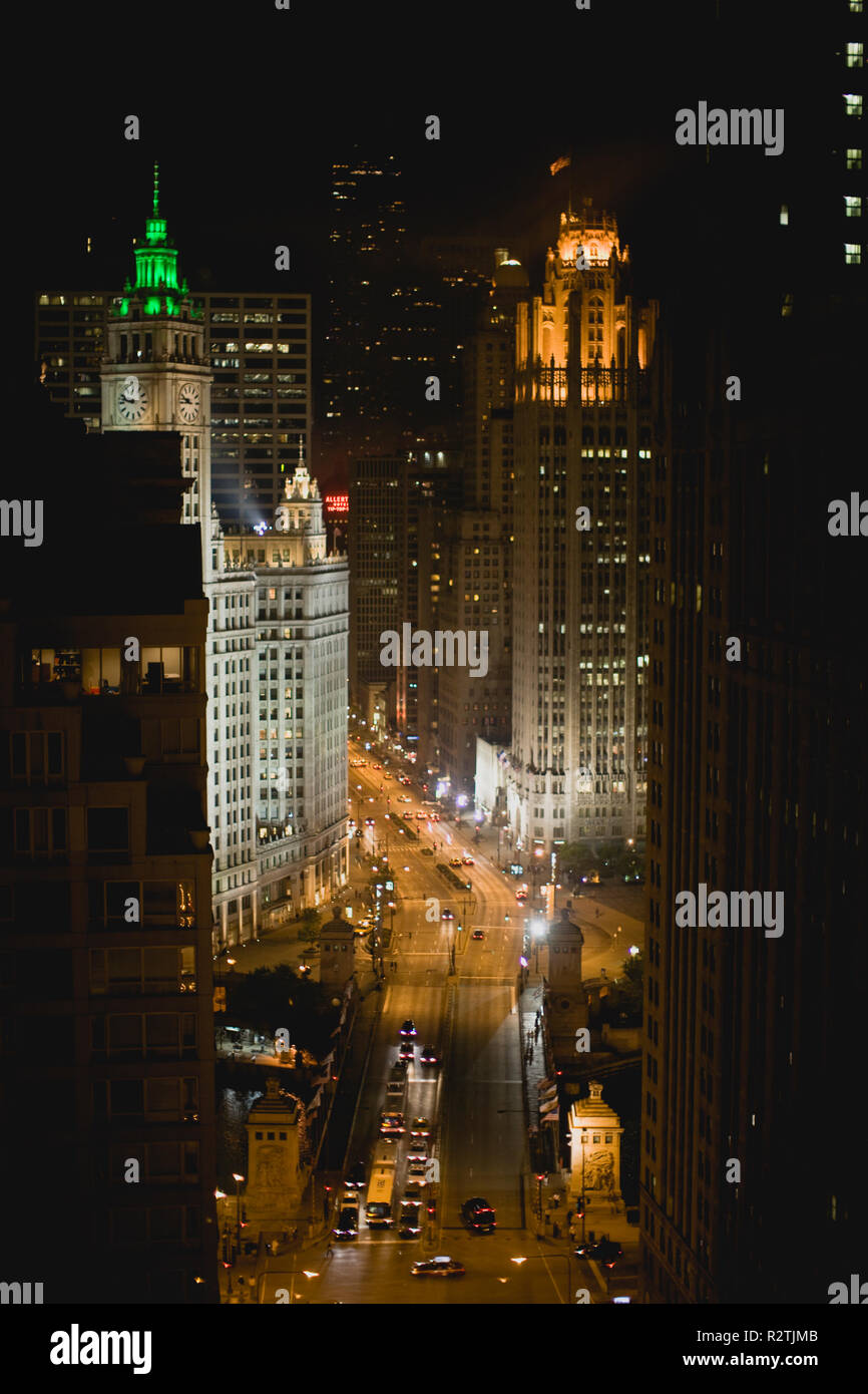 Exterior of buildings in a city at night time Stock Photo - Alamy