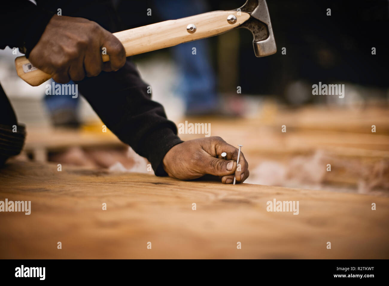 Hammers in nails hi-res stock photography and images - Alamy