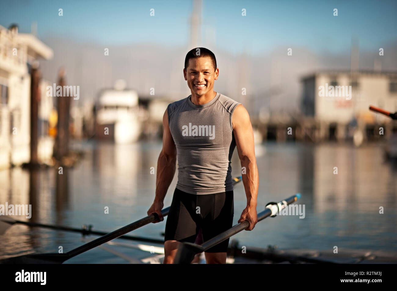 Man carry rowing boat hi-res stock photography and images - Alamy