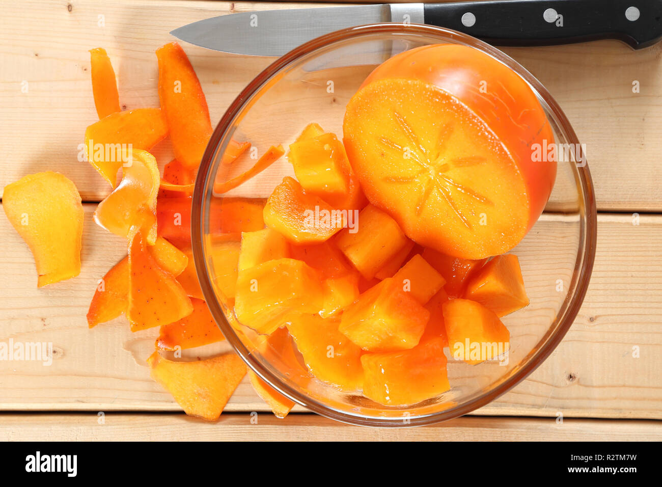 Plate persimmon knife kitchen hi-res stock photography and images - Alamy
