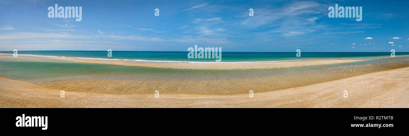 Wooden mooring posts and the ocean Stock Photo - Alamy