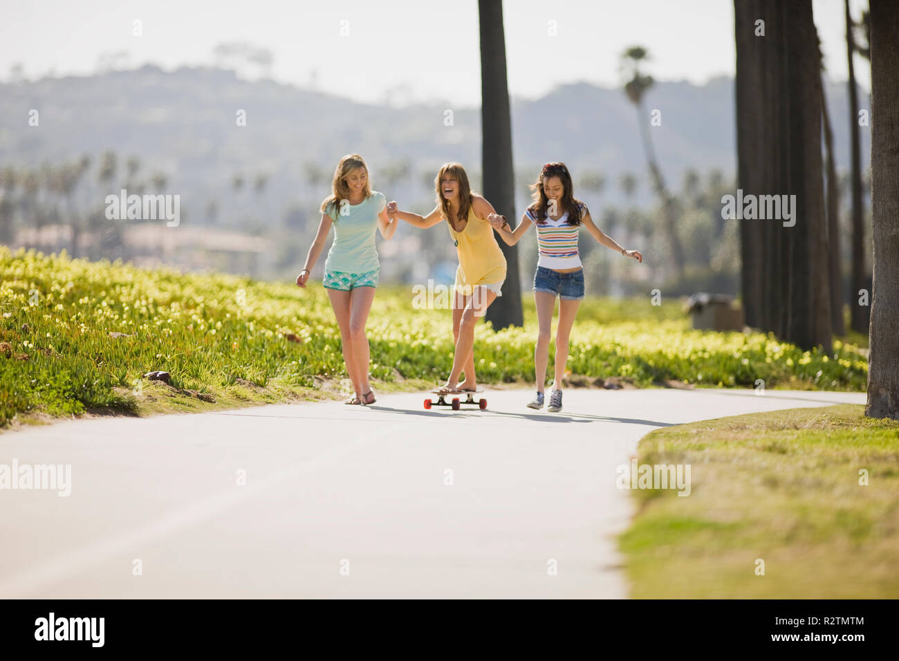 Female skateboarders skateboarding together hi-res stock photography ...
