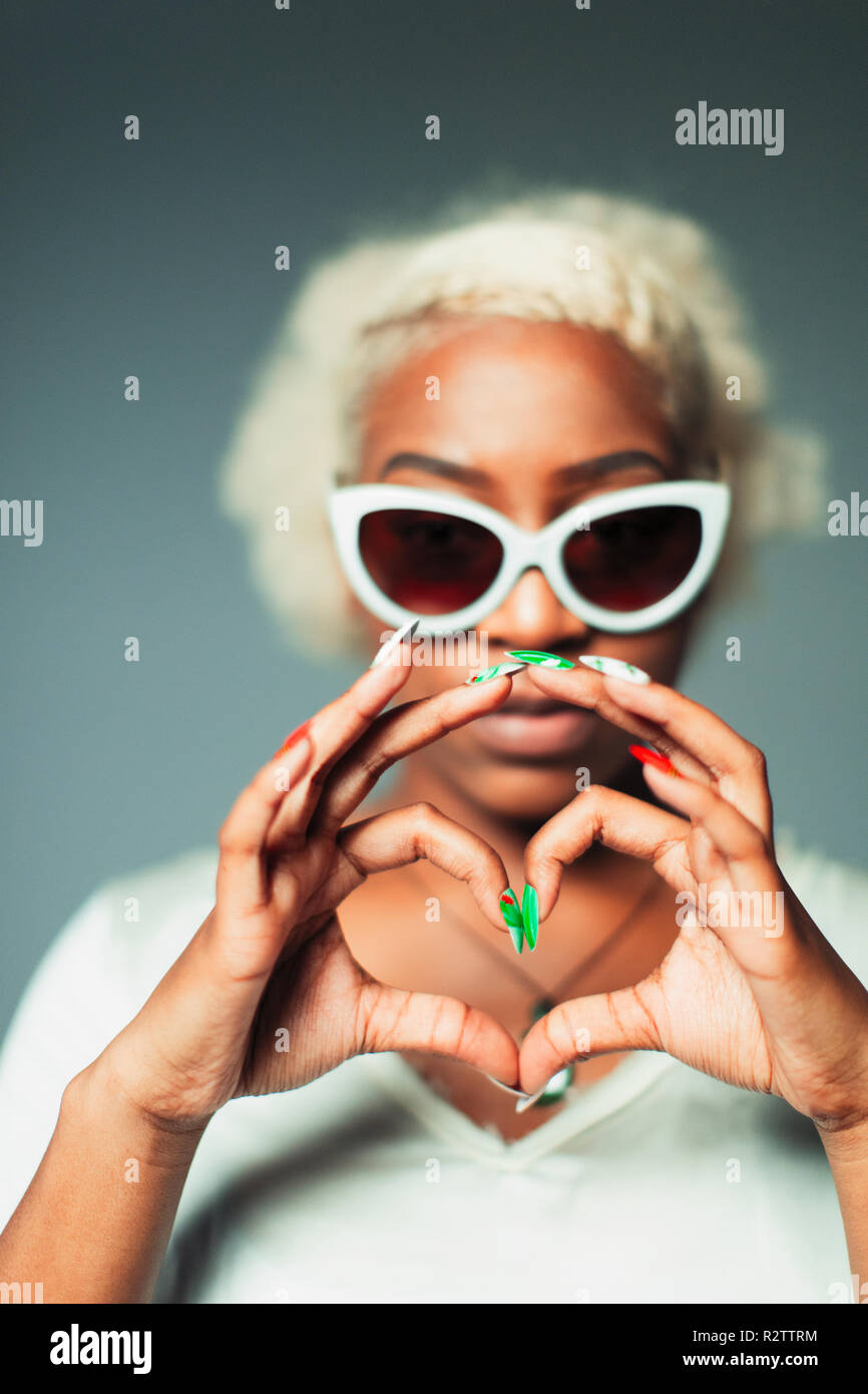 Hand heart sign hi-res stock photography and images - Alamy