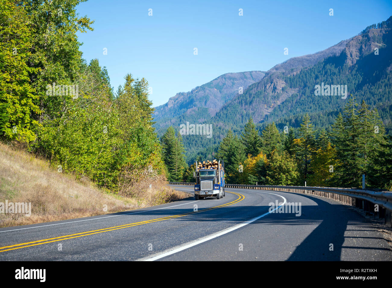 Big rig day cab American powerful semi truck with protective shield ...