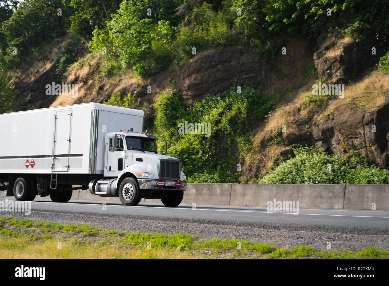 Middle size white day cab semi truck for local deliveries with long ...