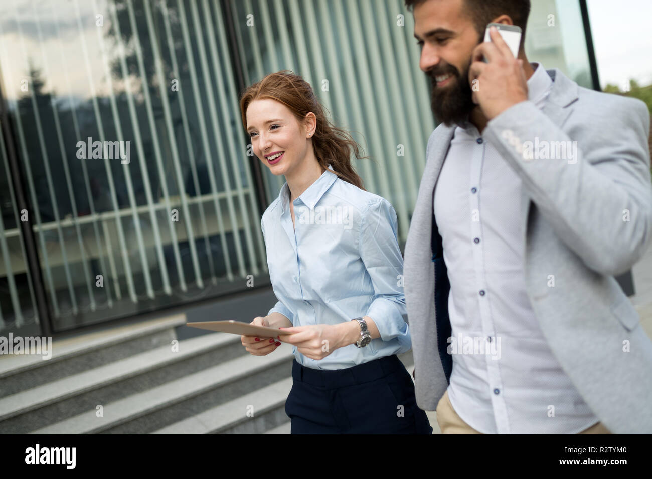Businessman young woman walking hi-res stock photography and images - Alamy