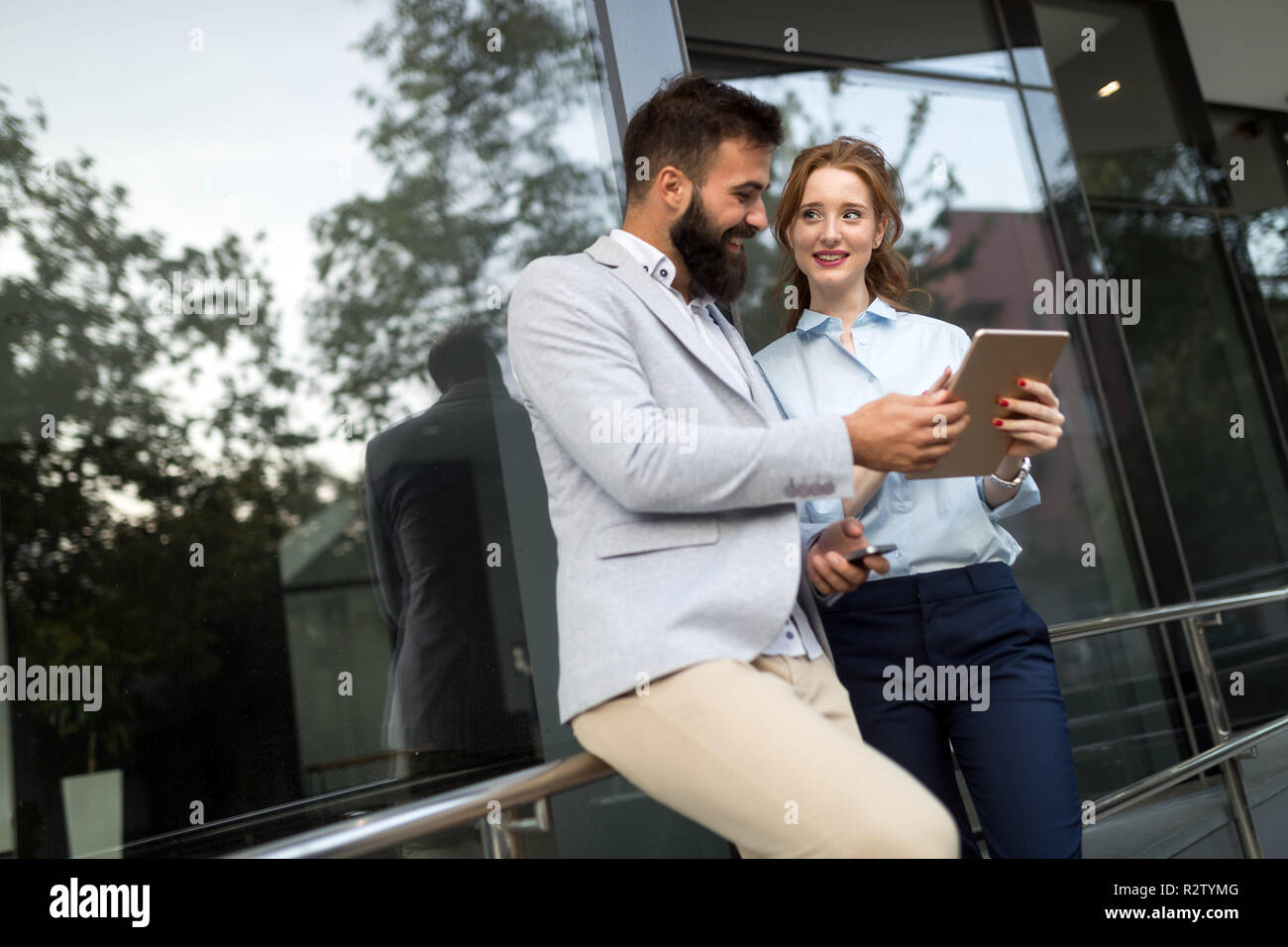 Business people or businessman and businesswoman working outdoor Stock ...
