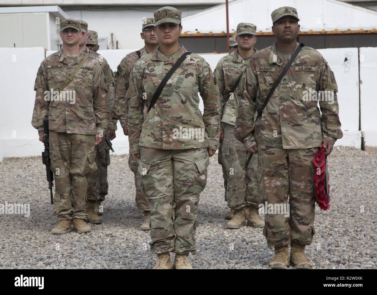 U.S. soldiers assigned to Task Force Besmaya stand in formation during ...