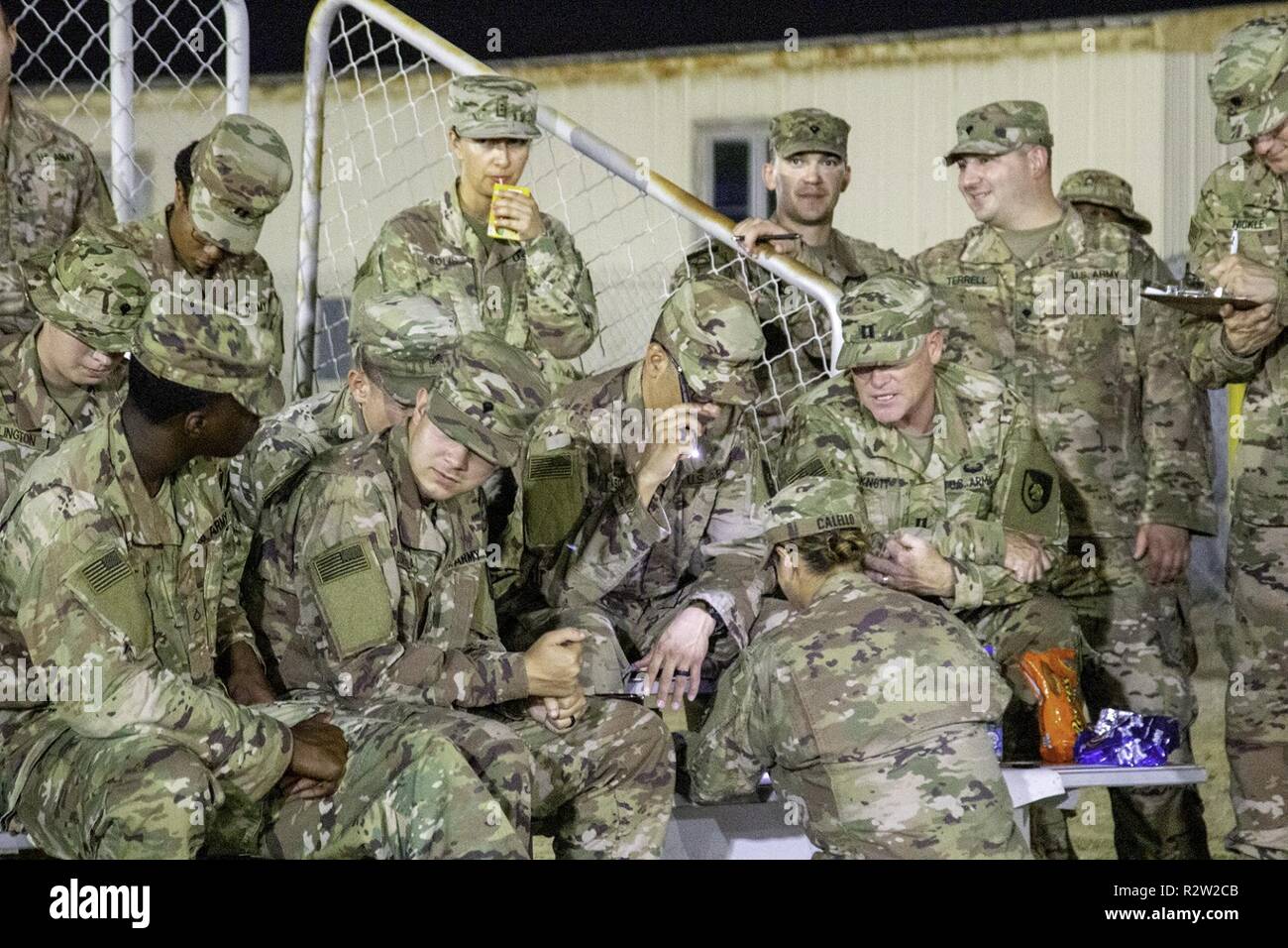 Soldiers of the 300th Sustainment Brigade working together to build a ...