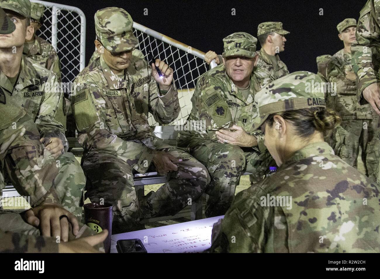 Soldiers of the 300th Sustainment Brigade working together to build a ...