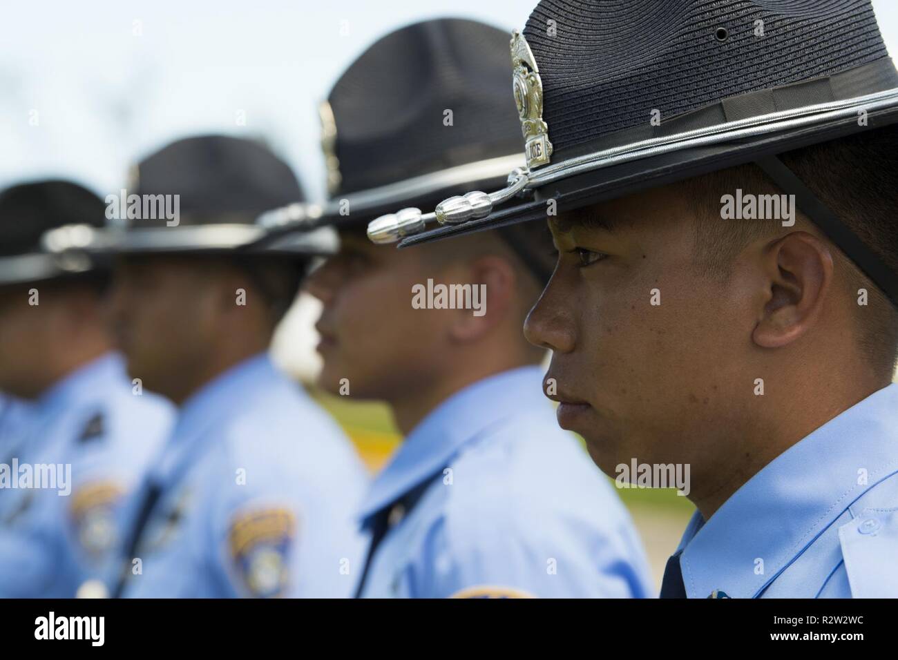Members of Saipan's Department of Public Safety stand in formation ...