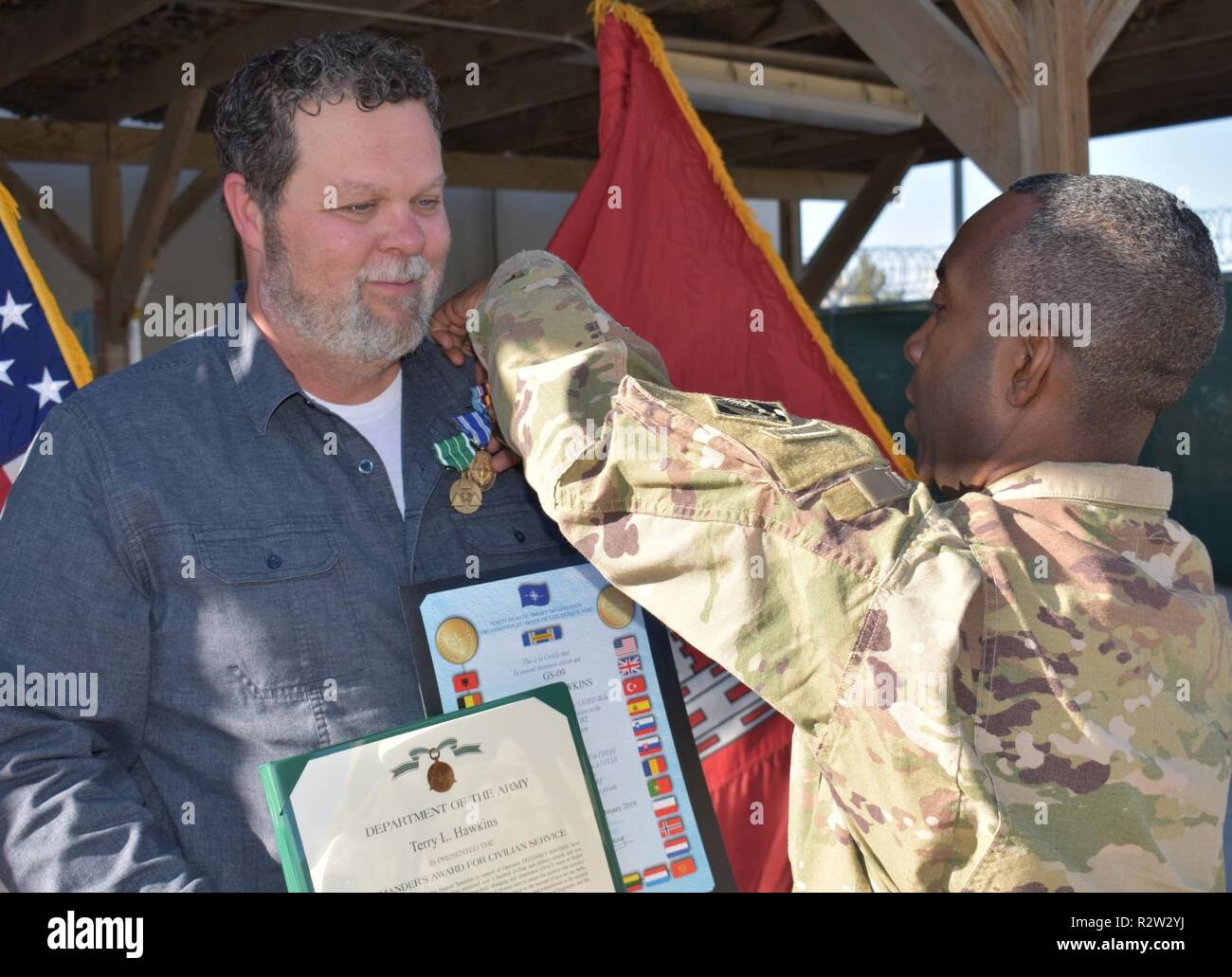 Afghanistan District Commander, Colonel Jason Kelly presents Terry ...