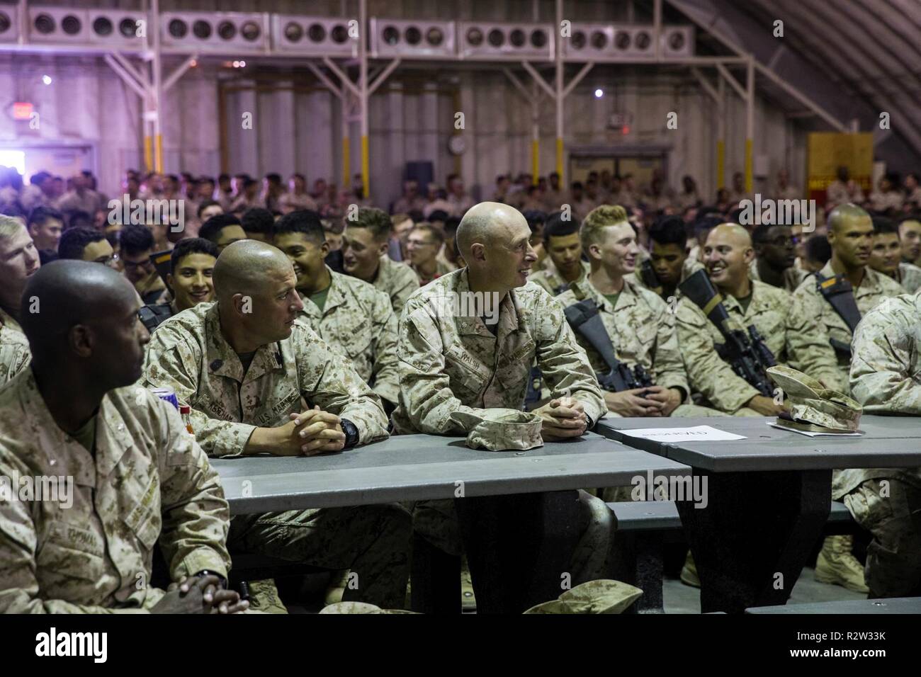 U.S. Marine Lt. Col. Sean Walsh, center, and Sgt. Maj. Don Ketcham ...