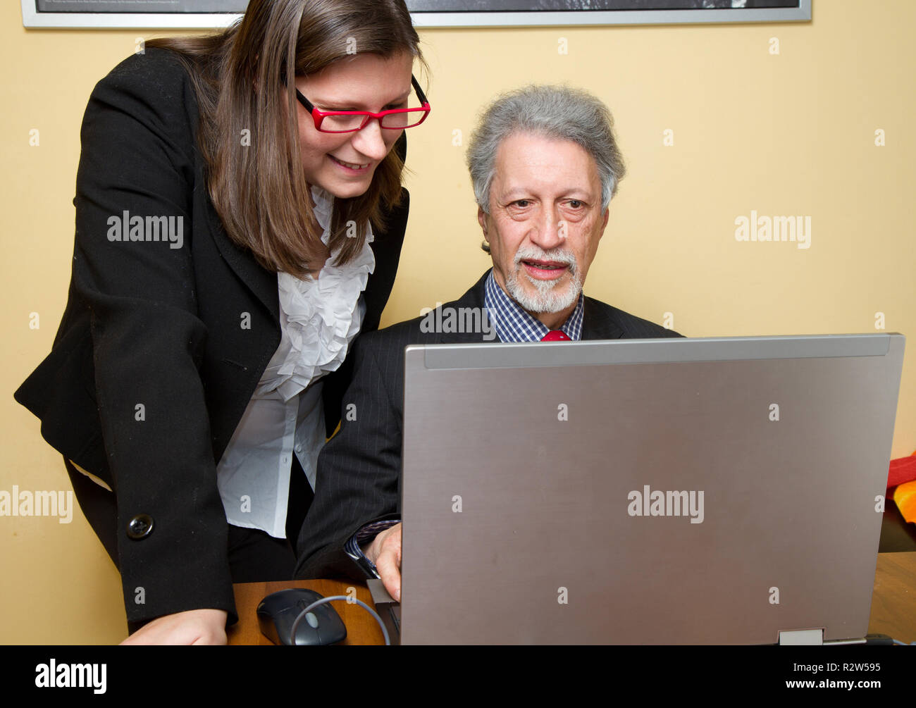 Joyful man assistant speaking computer hi-res stock photography and ...
