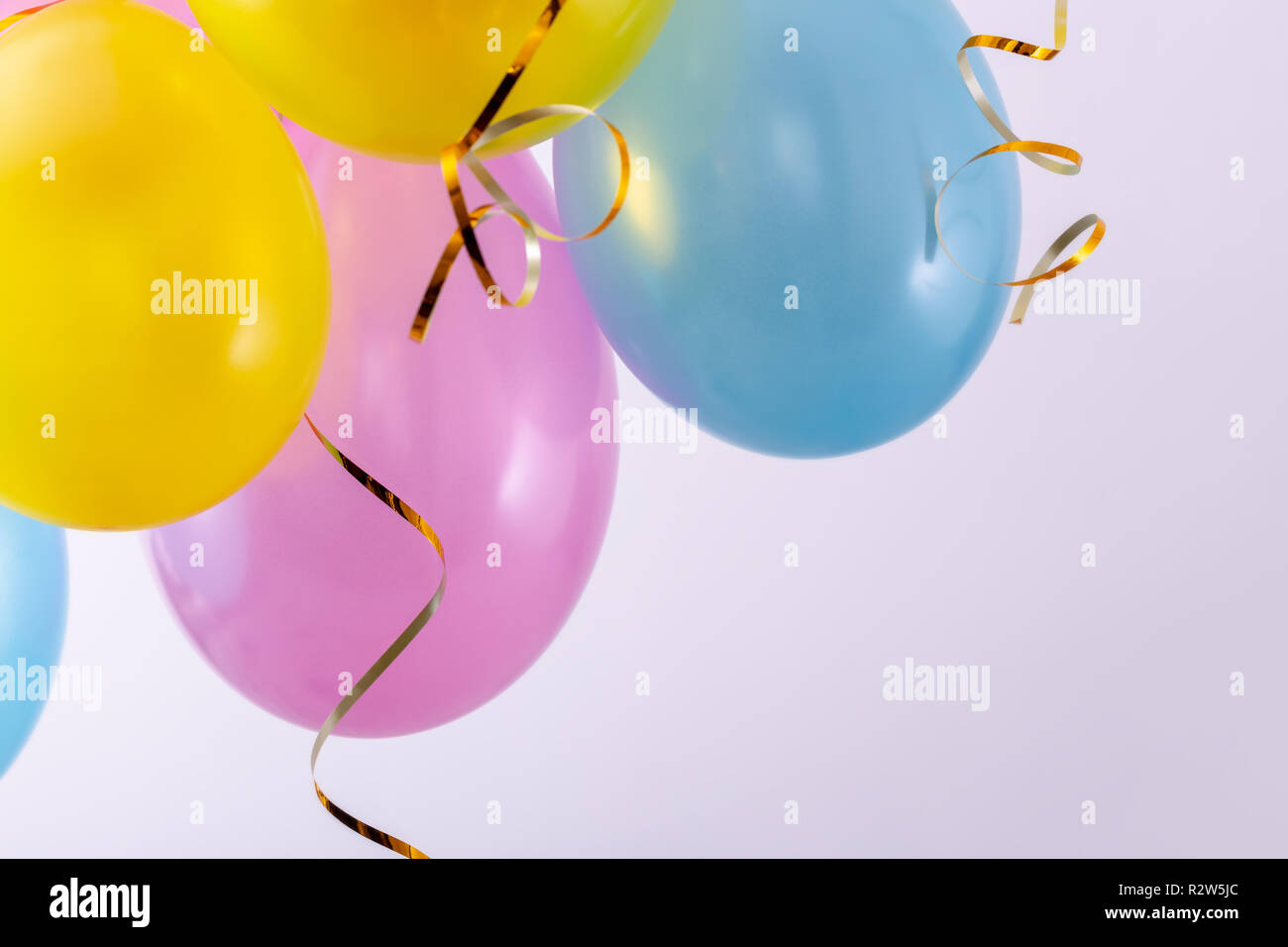 Colorful balloons to fun party on carnival or birthday Stock Photo - Alamy