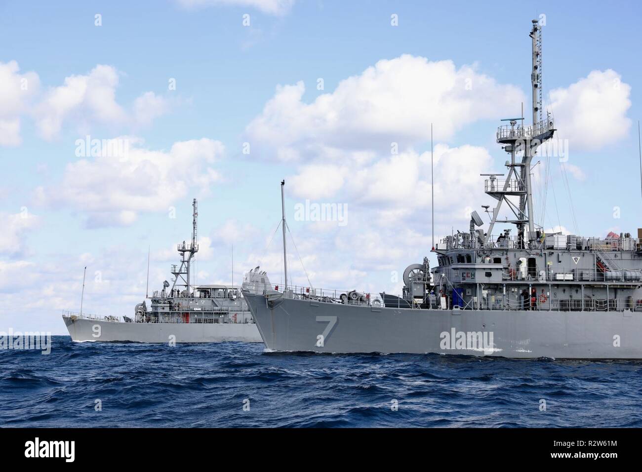 The Avenger-class mine countermeasures ship USS Patriot (MCM 7) and USS ...