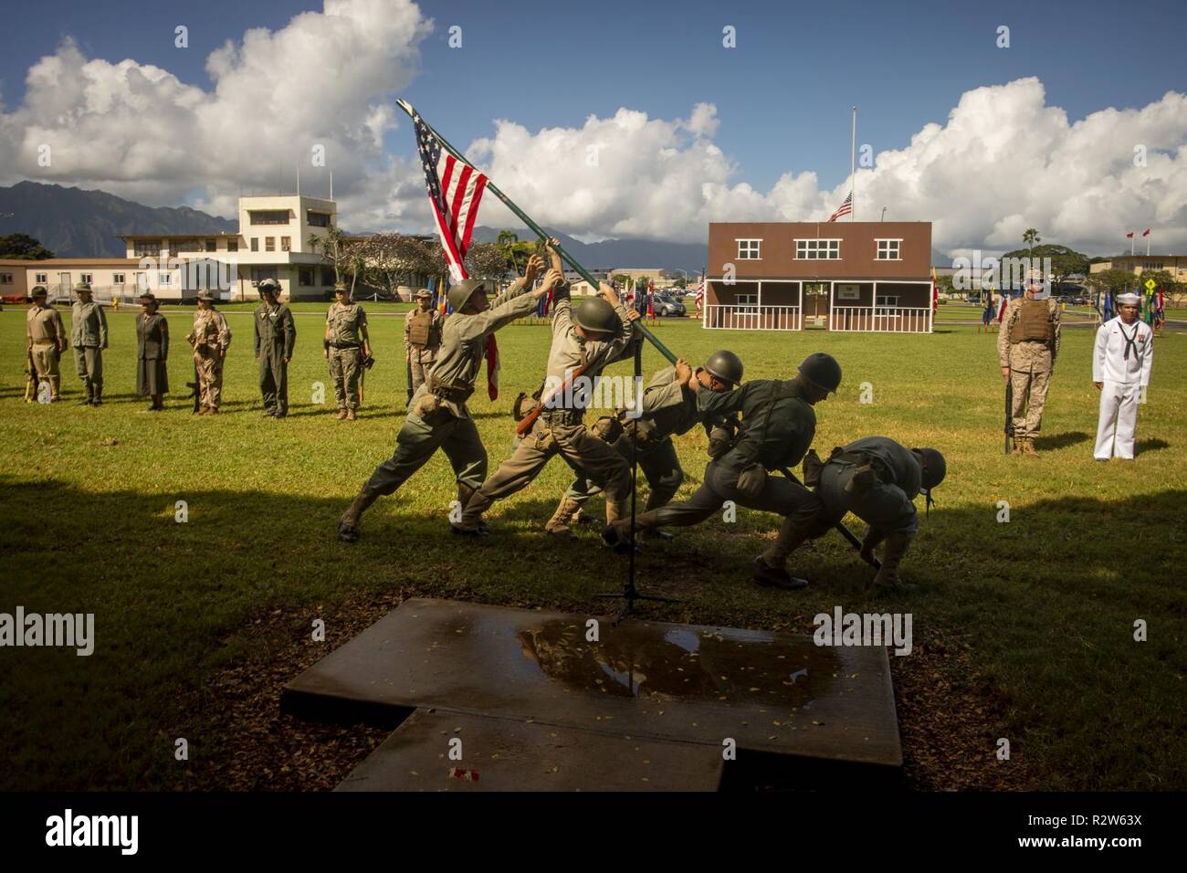 U.S. Marines reenact the raising of the flag on Mt. Suribachi from the ...