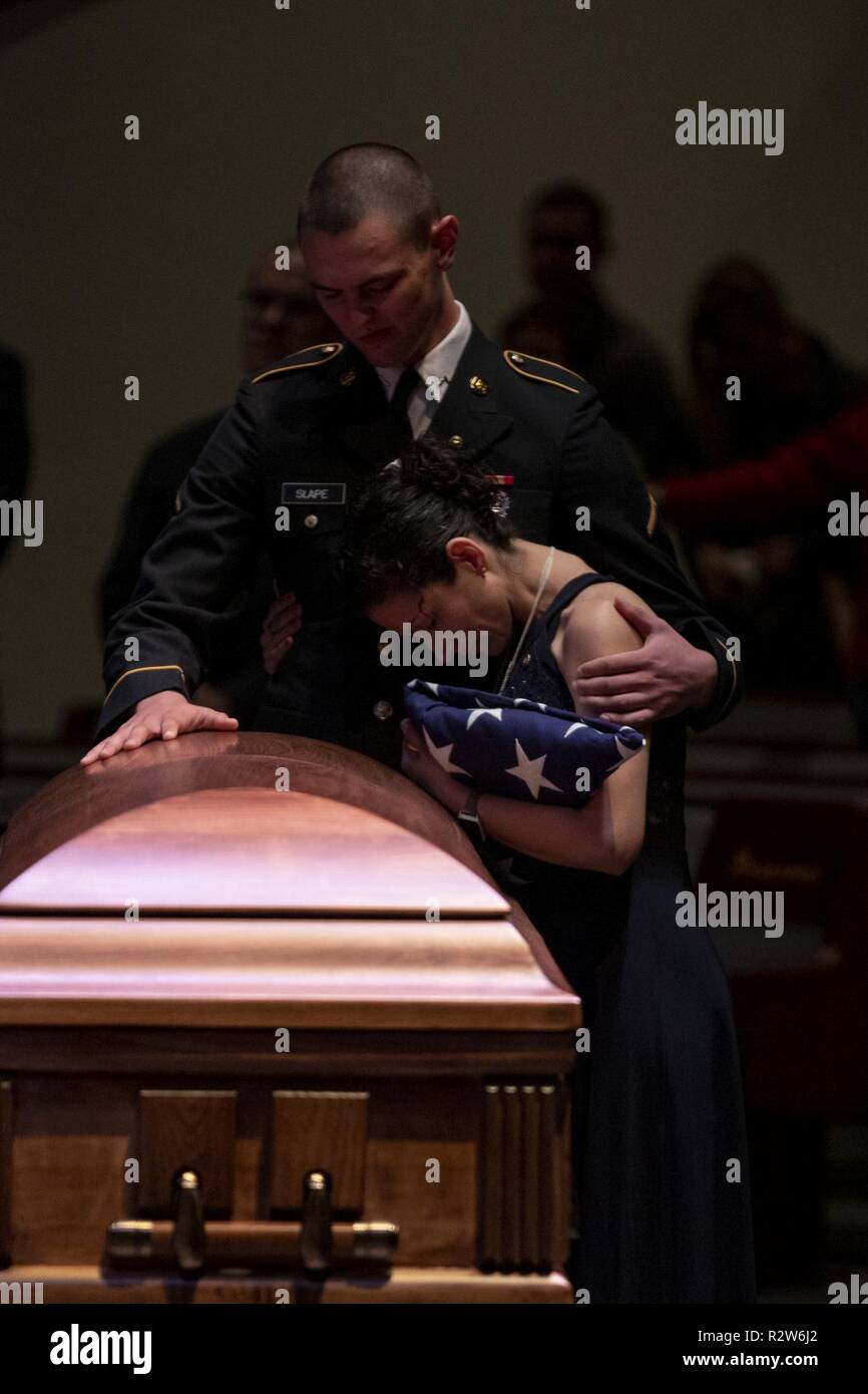 The family of Sgt. James Slape, his wife, Shawn Slape, and his brother ...