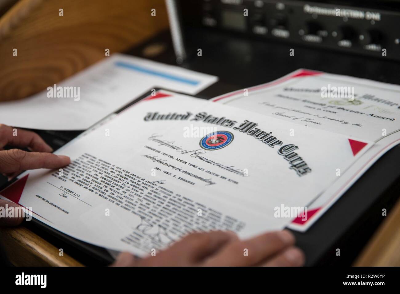 A certificate of commendation is read at the Quarterly Length of ...