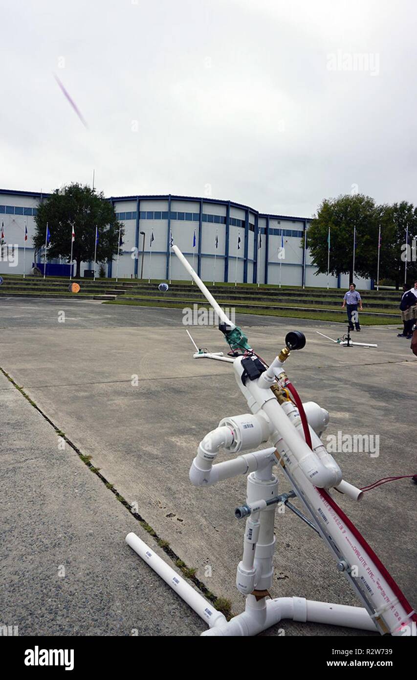 A paper rocket is launched from a high-capacity launcher at a Science ...