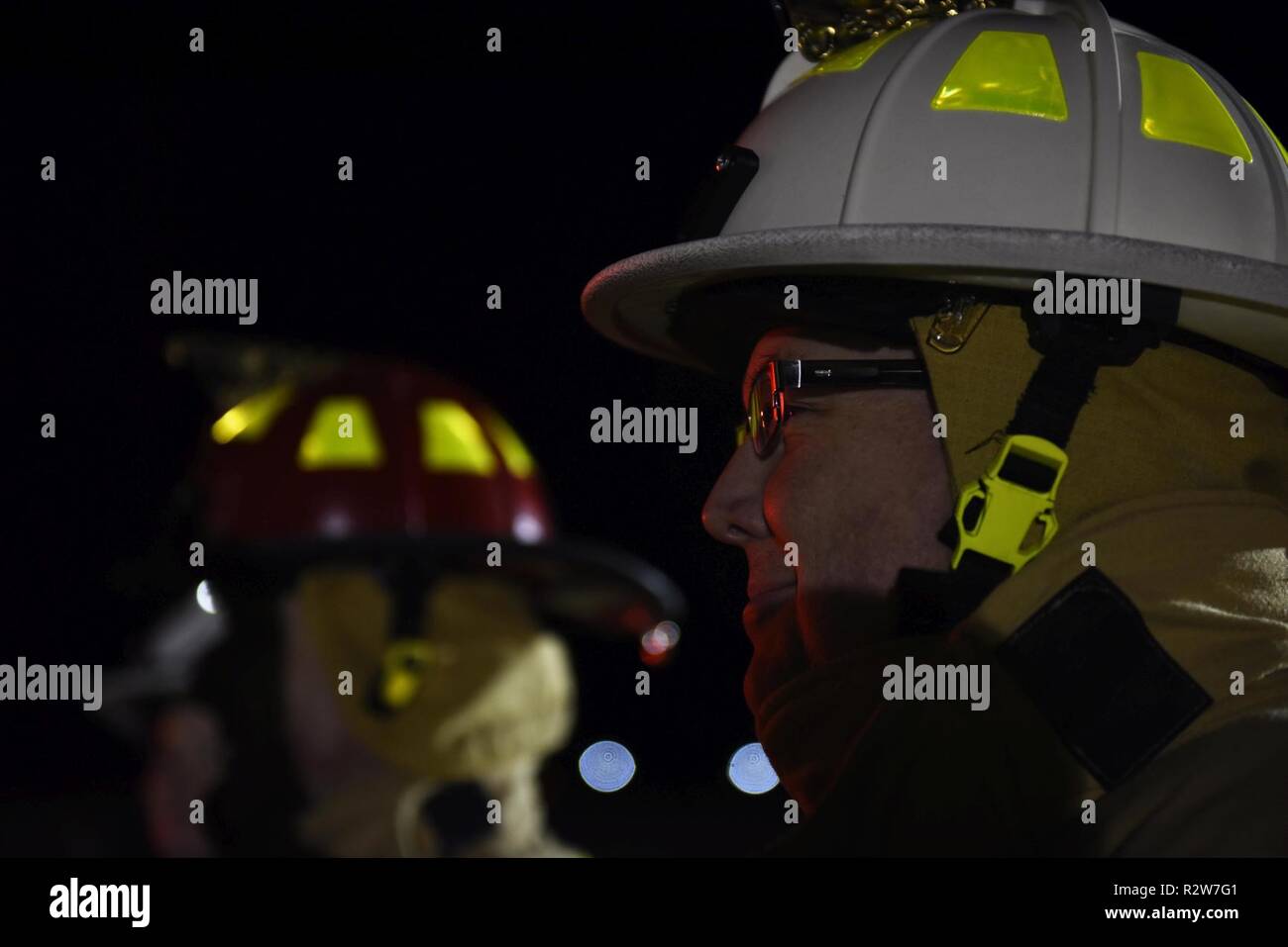 Col. Russell Davis, 92nd Operations Group commander, listens to a ...