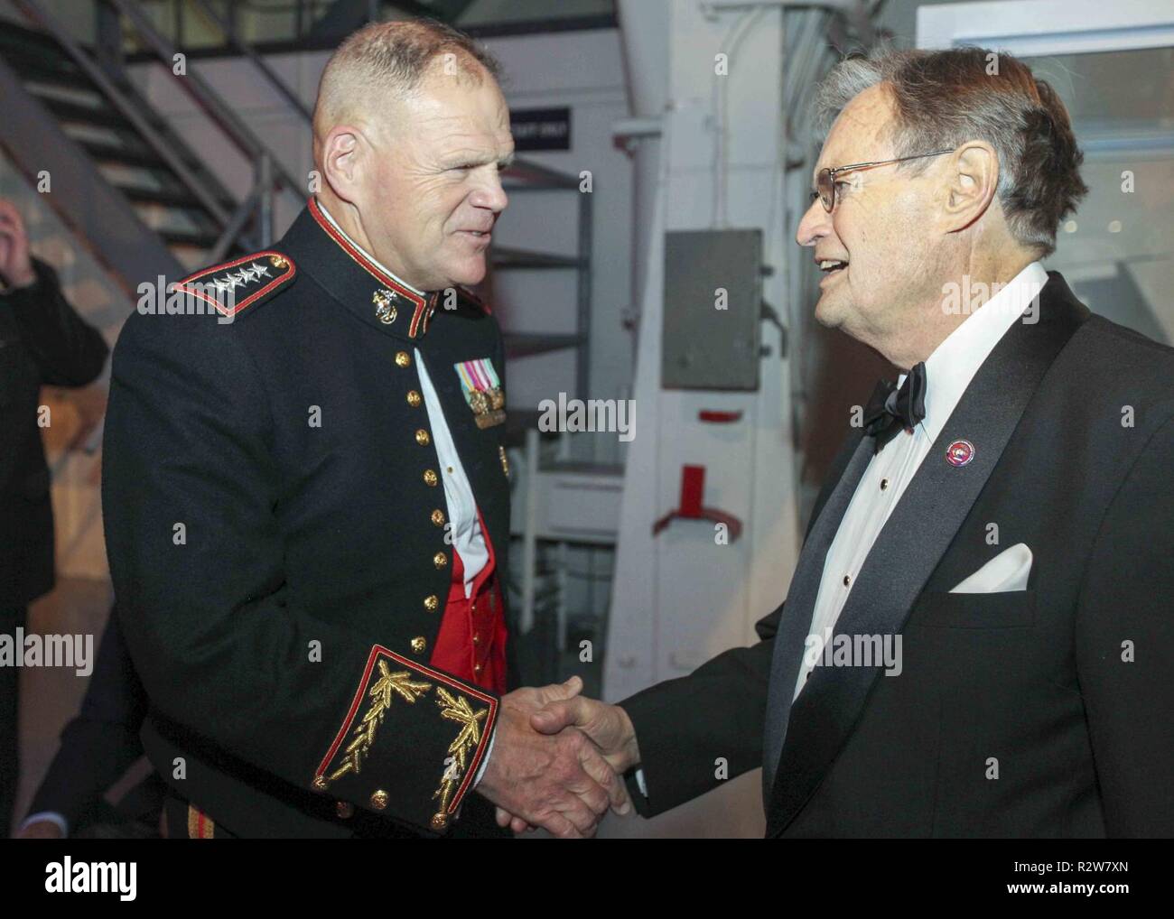 Commandant of the Marine Corps Gen. Robert B. Neller, left, shakes ...