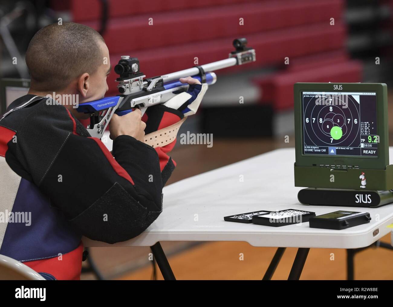 A competitor shoots an air rifle during the Pacific Regional Trials ...