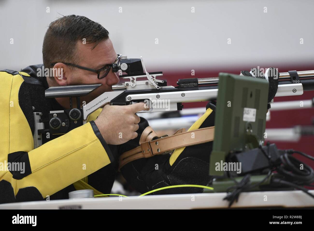 A competitor shoots an air rifle during the Pacific Regional Trials ...