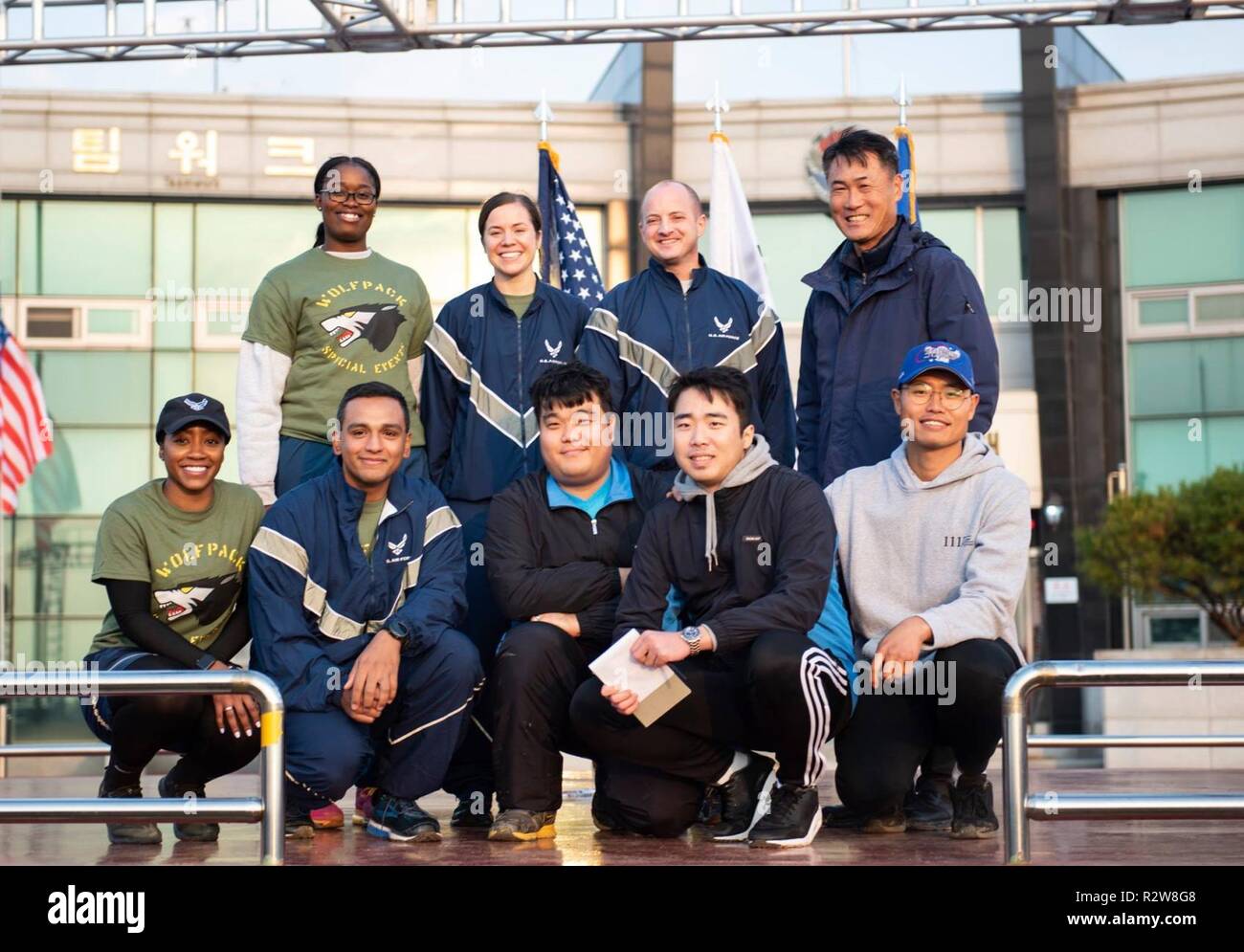 8th Force Support Squadron members pose for a group photo with Col ...