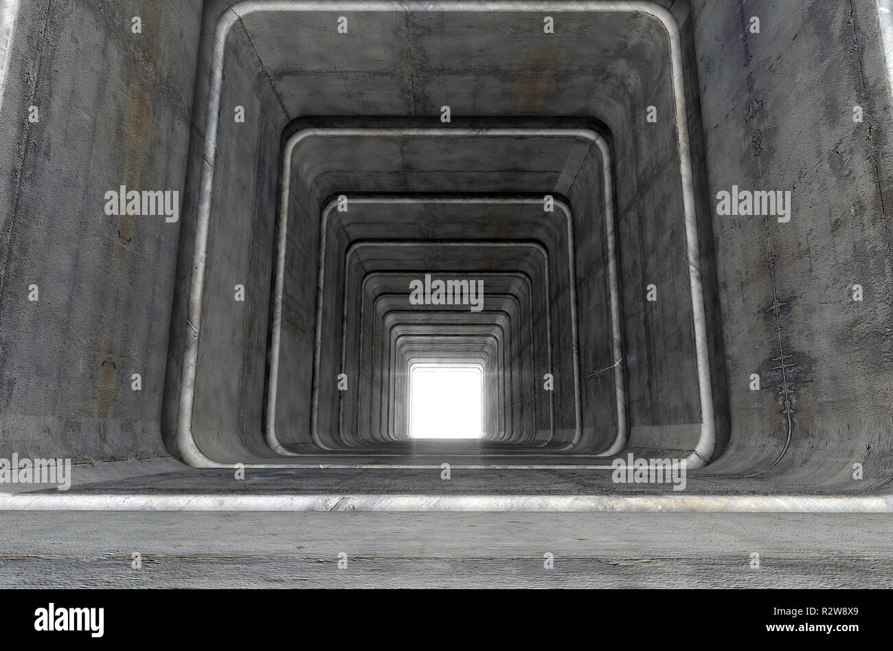 A look down a concrete tunnel made out of square geometric shapes with ...