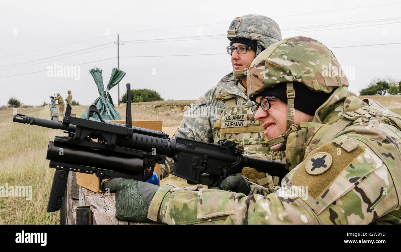 Sgt. Joseph Wester, 184th Sustainment Command, aims the M320 grenade ...