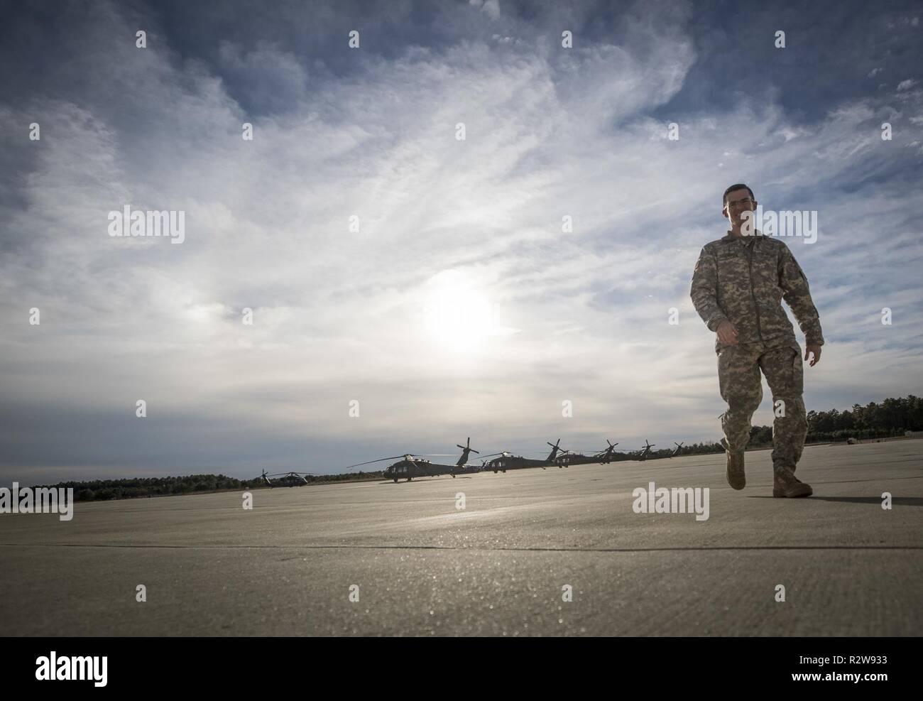 U.S. Army Chief Warrant Officer 2 Bryan Breza, a UH-60L Black Hawk ...