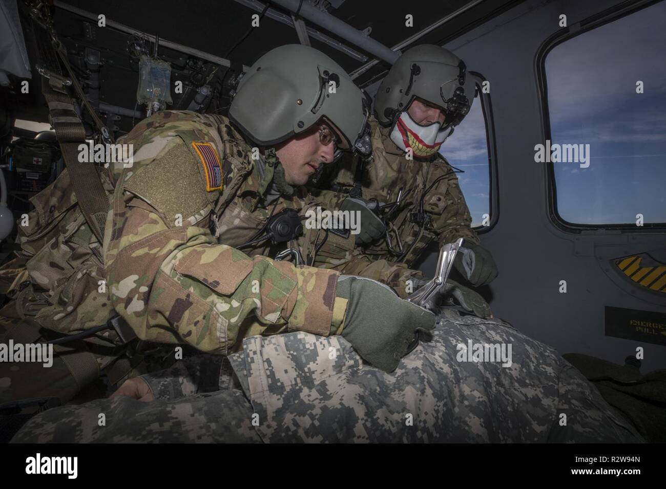 U.S. Army Sgt. Deven Scelfo, left, a flight medic, and Spc. Gabriel ...