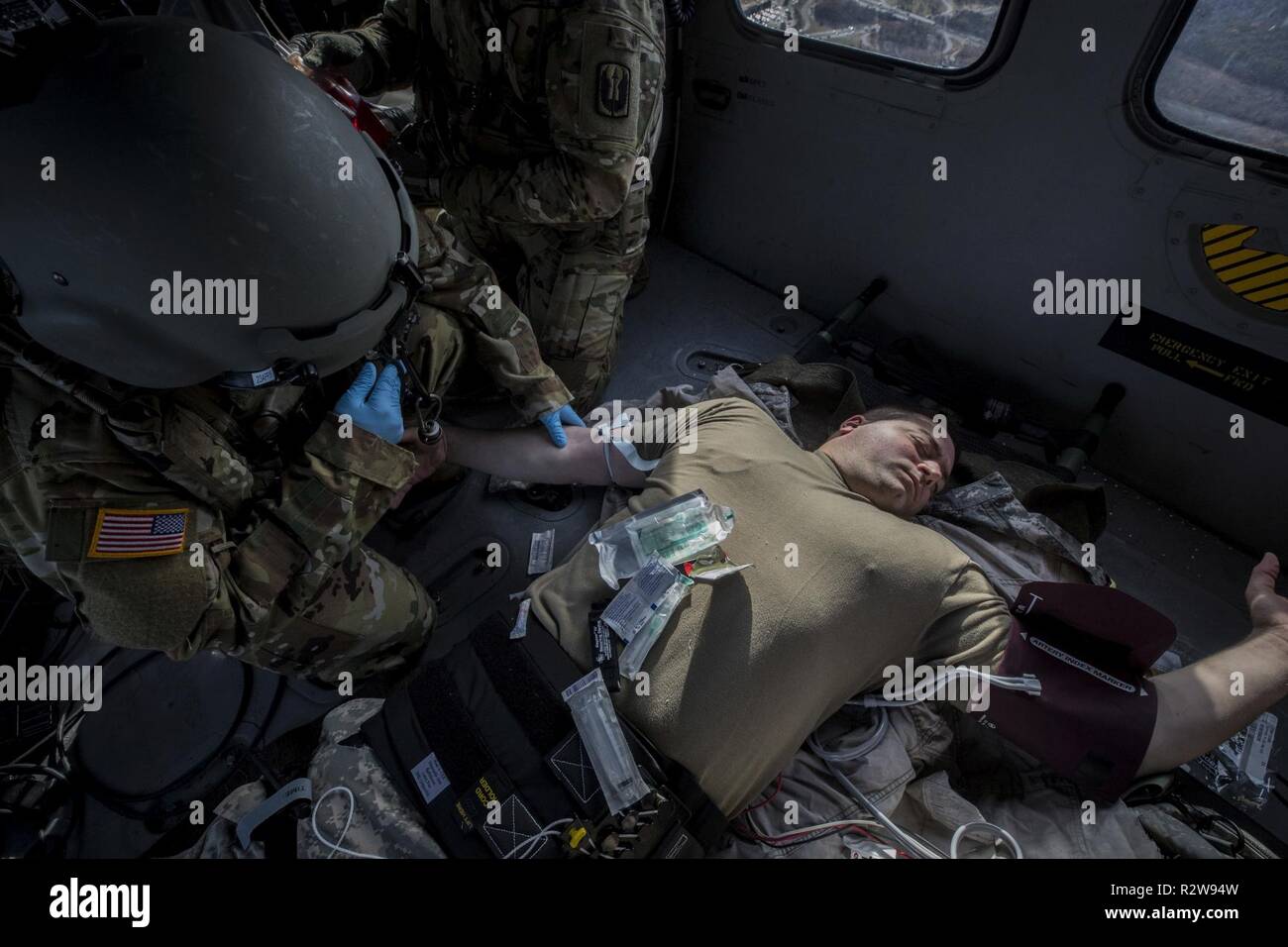U.S. Army Sgt. Deven Scelfo, left, a flight medic, and Spc. Gabriel ...