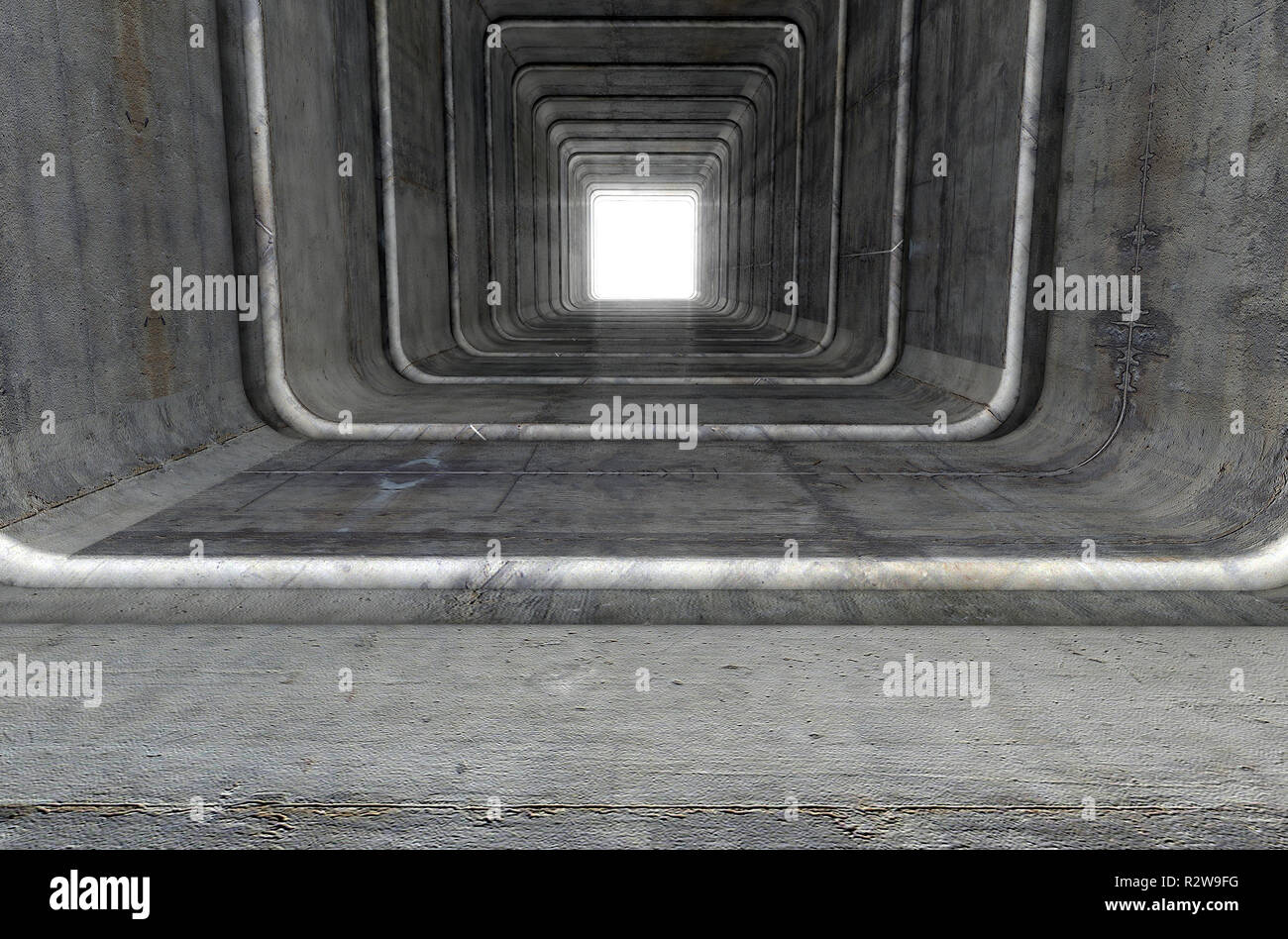 A look down a concrete tunnel made out of square geometric shapes with ...
