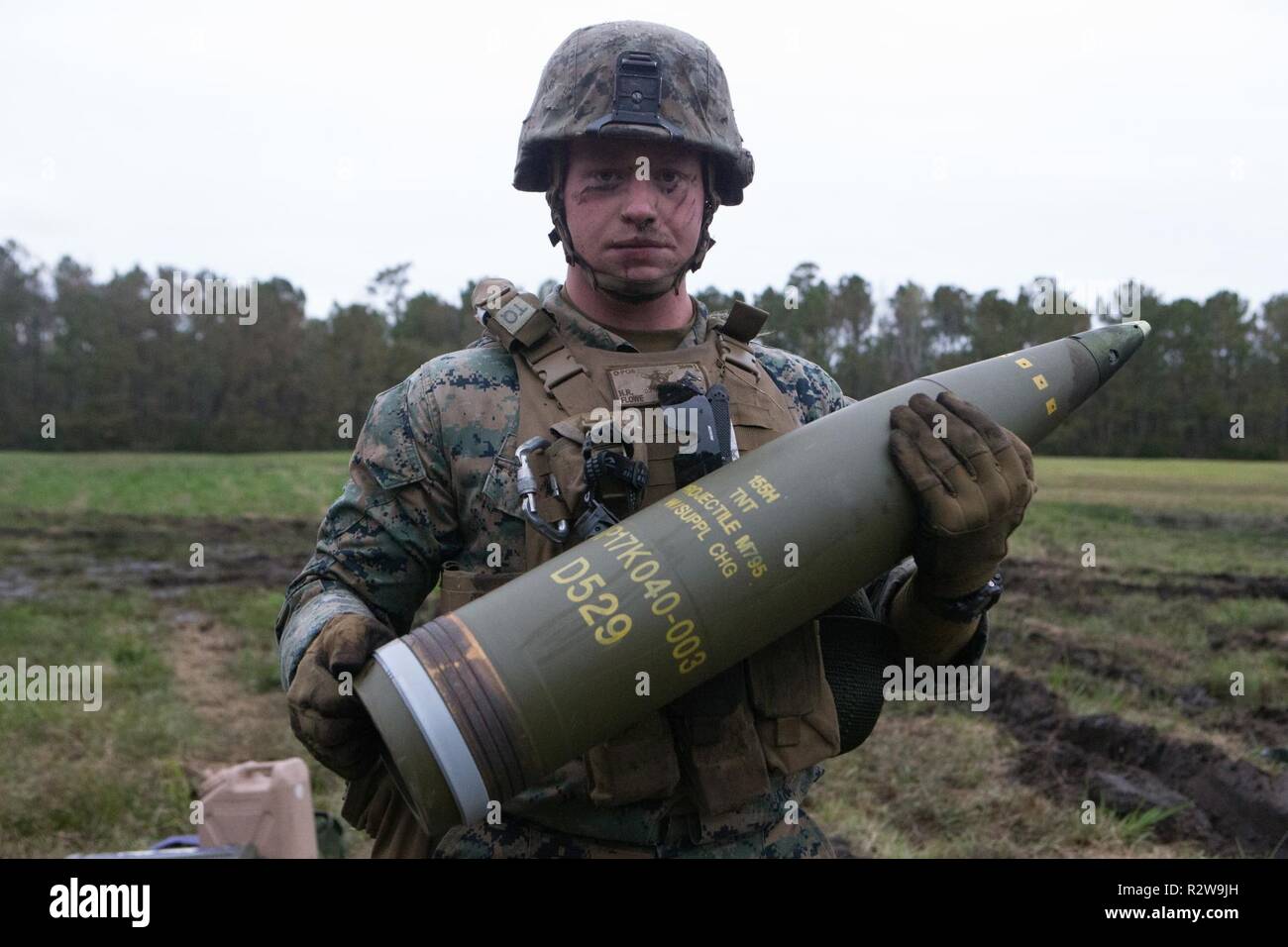 A U.S. Marine with 1st Battalion, 10th Marine Regiment holds a ...