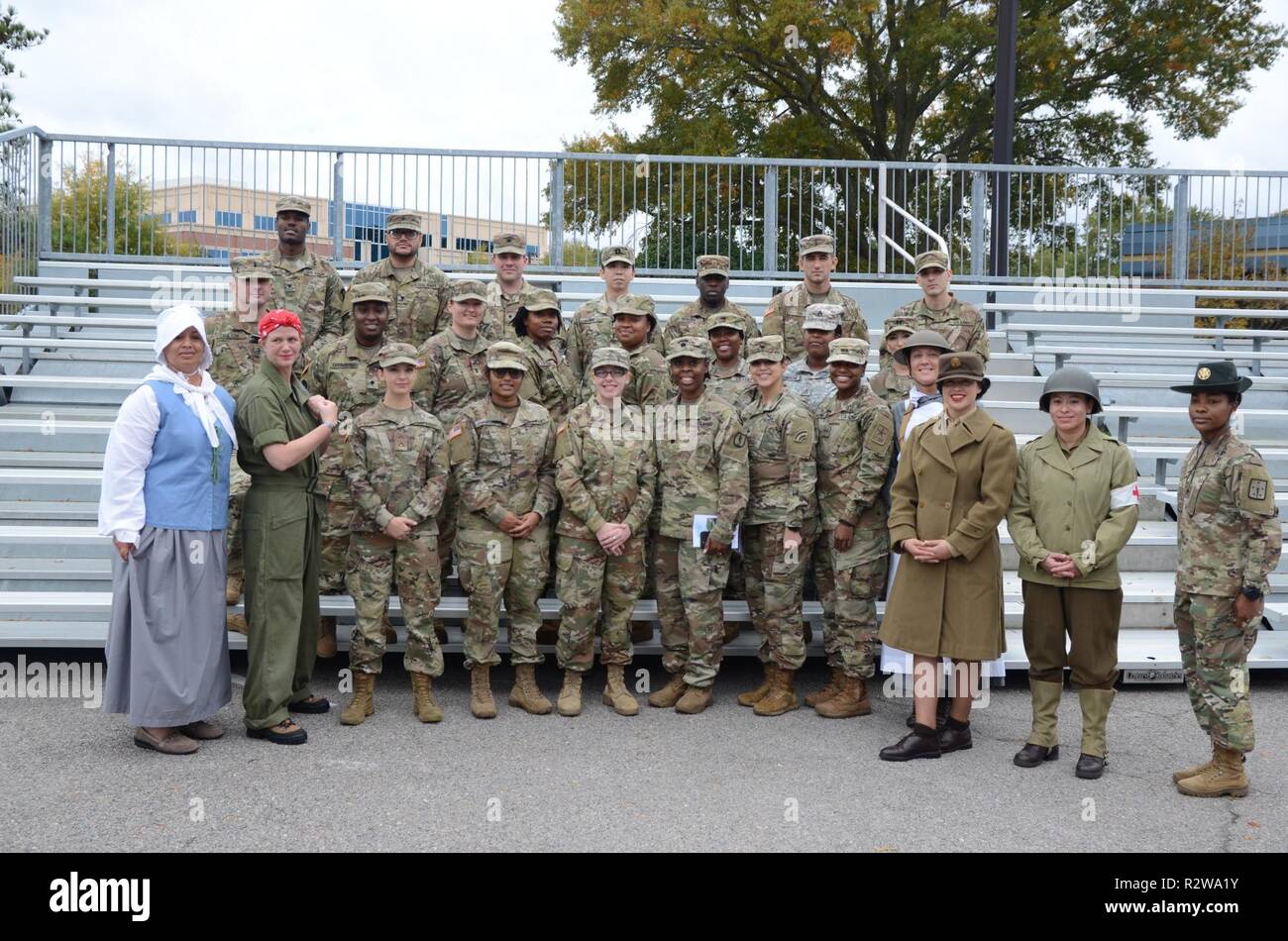 A group of Maryland Army National Guard soldiers stand with historical ...