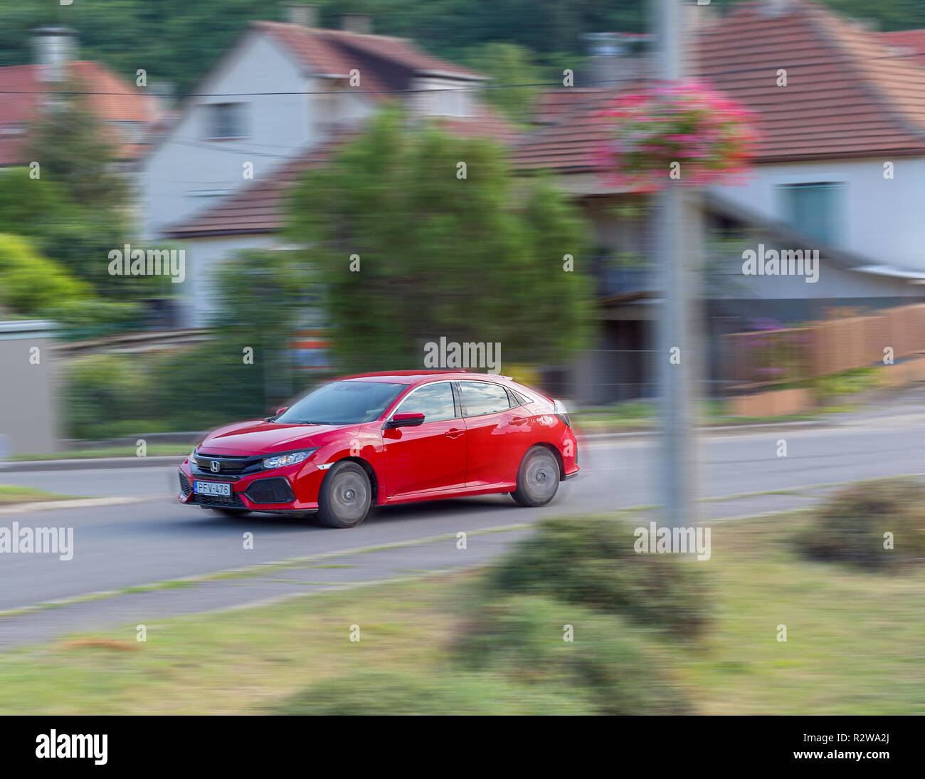 Red car rides hi-res stock photography and images - Alamy