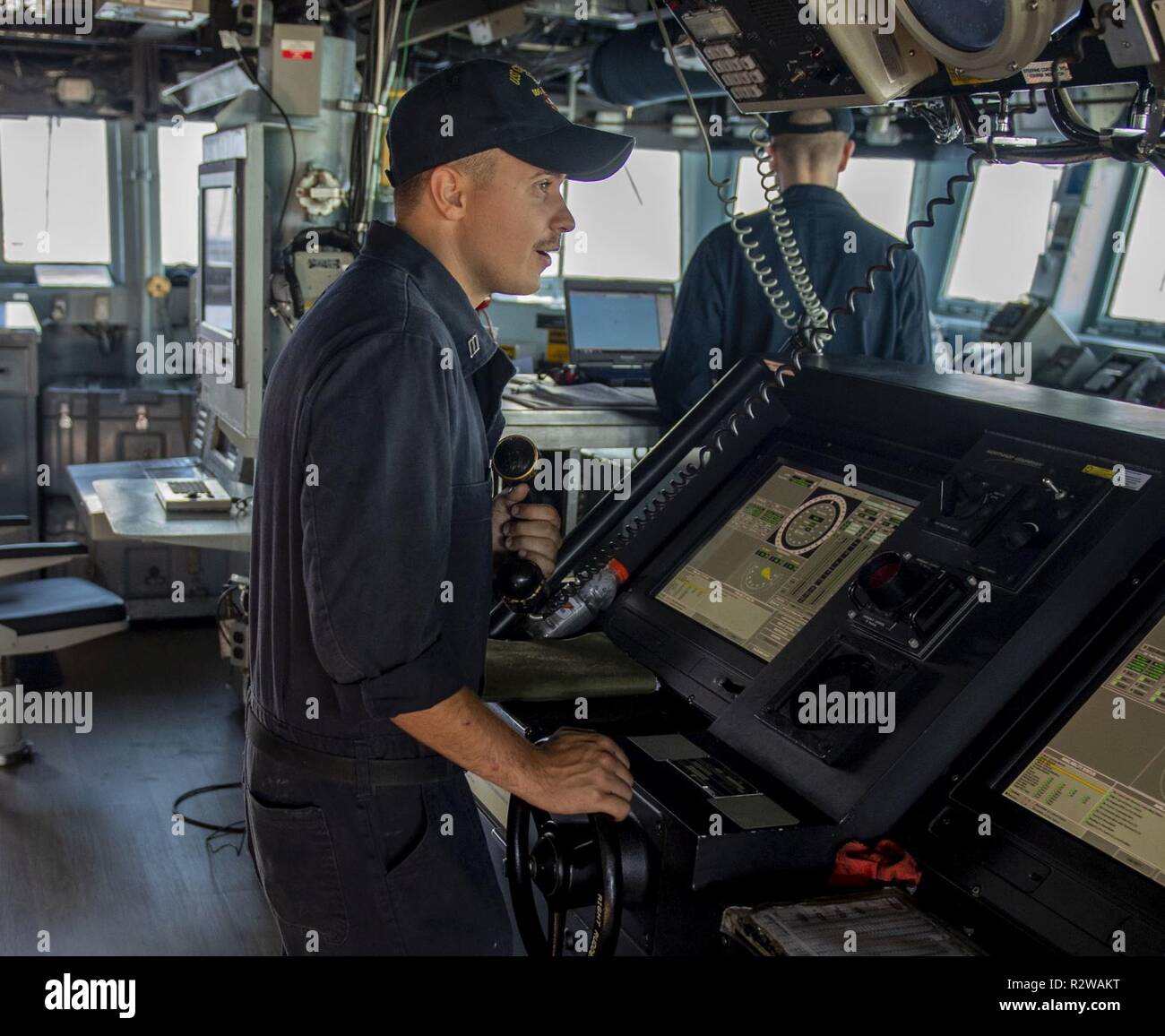 ATLANTIC OCEAN (Nov. 10, 2018) Seaman Zachary Schreiber stands helmsman ...