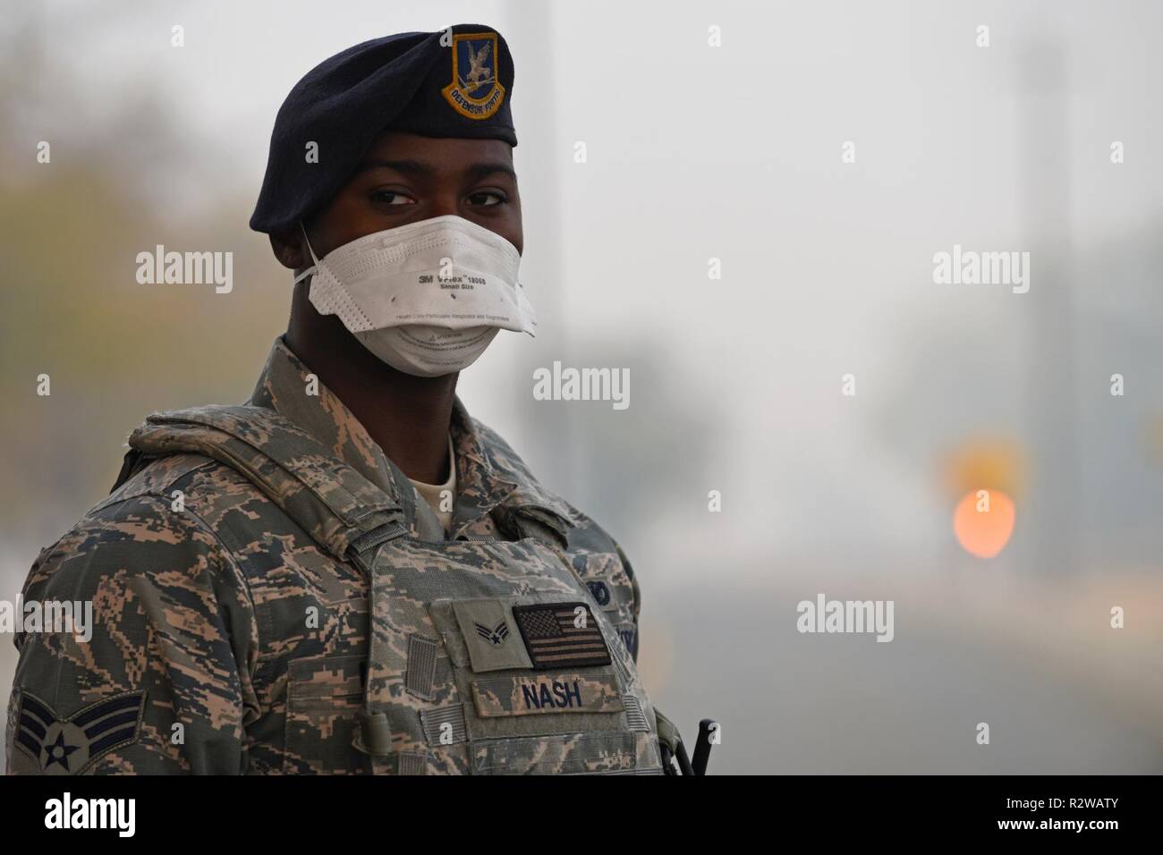 Senior Amn LeShawn Nash, 9th Security Forces Squadron, dons his N95 ...