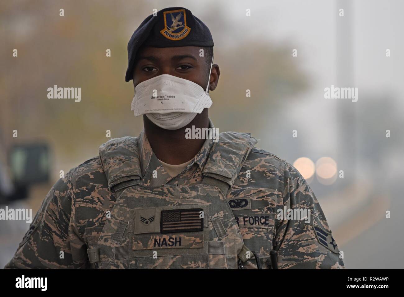 Senior Amn LeShawn Nash, 9th Security Forces Squadron, dons his N95 ...