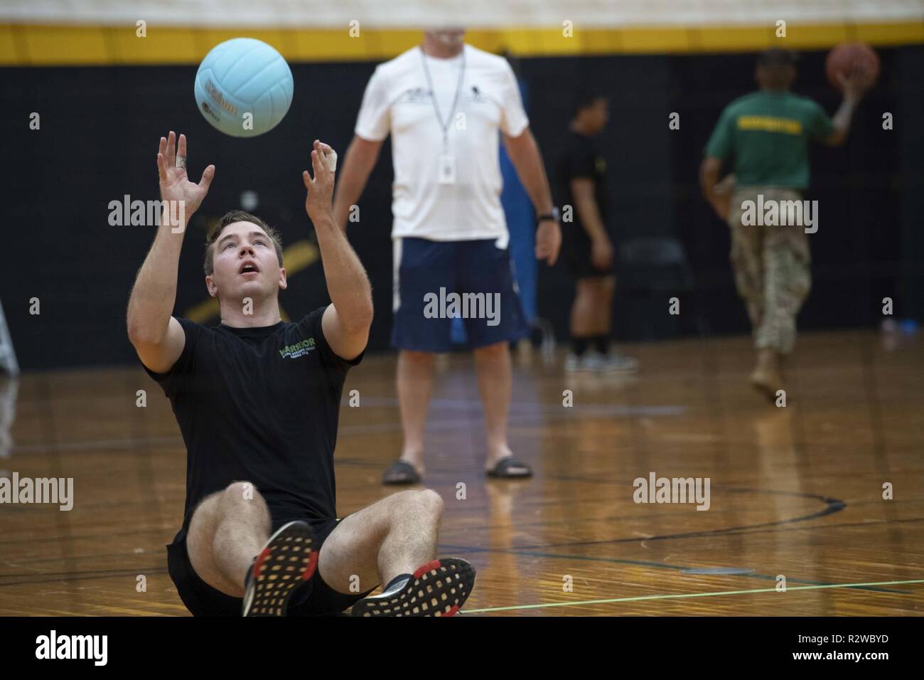 Sitting Volleyball requires players to maintain contact between their ...