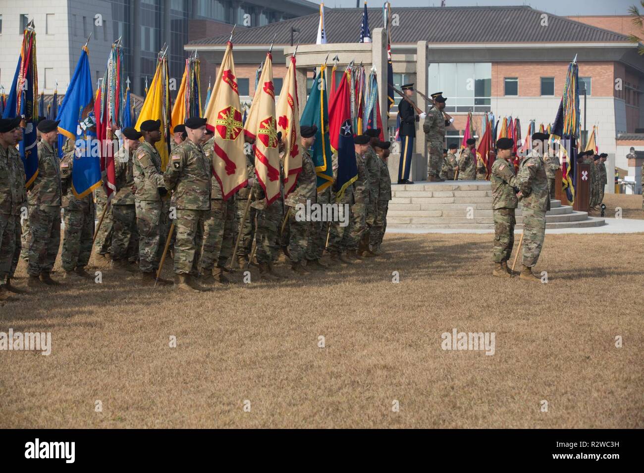Eighth Army subordinate units stand in formation during the change of ...