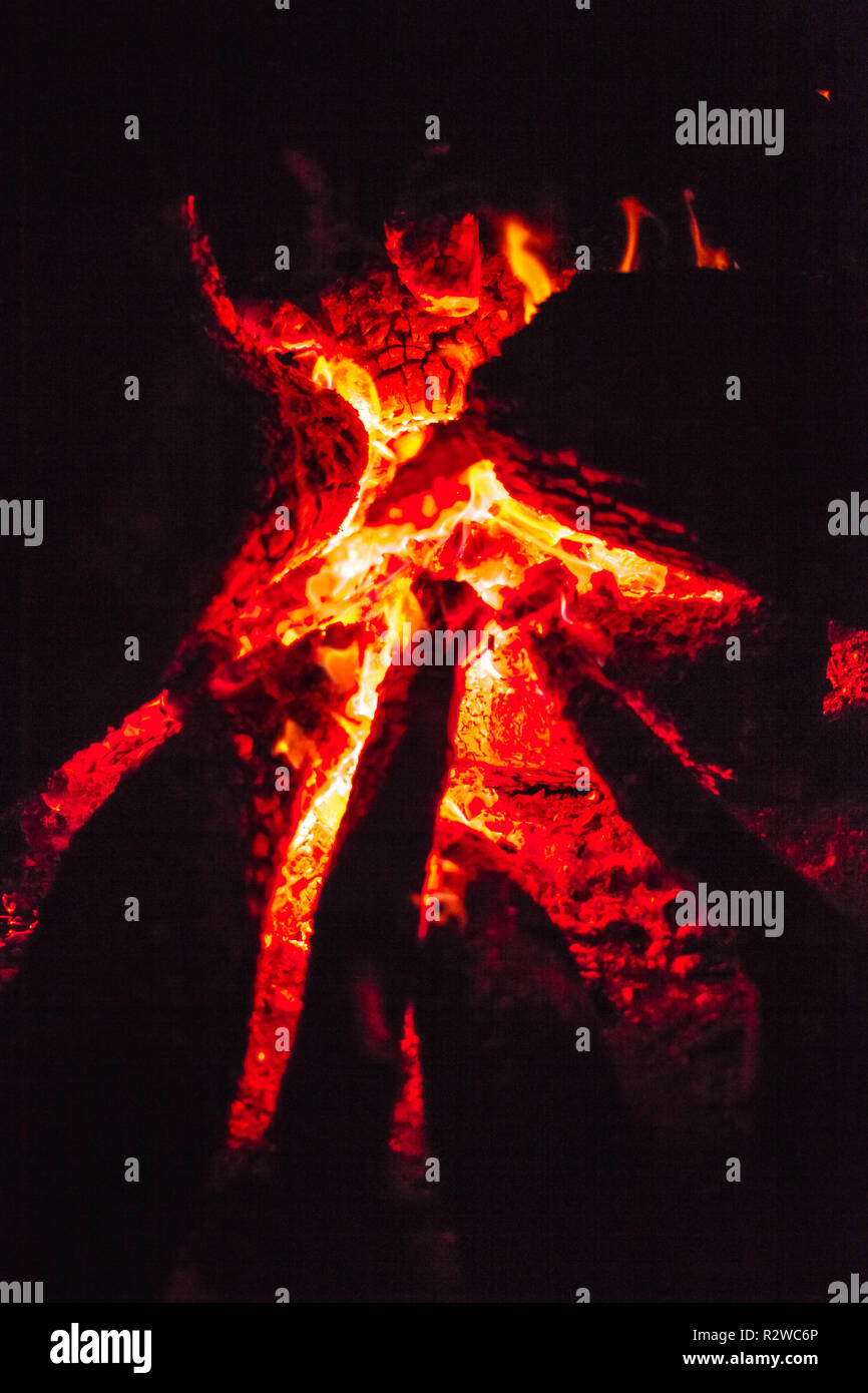 Wood burning at night. Campfire outdoors with flames. Close-up of ...