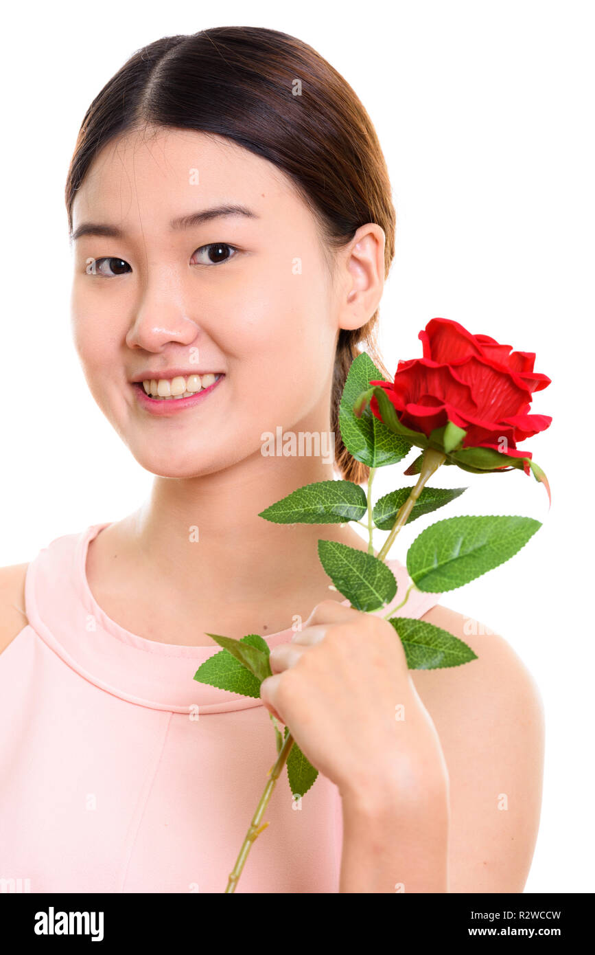 Smiling lady red rose looking hi-res stock photography and images - Alamy