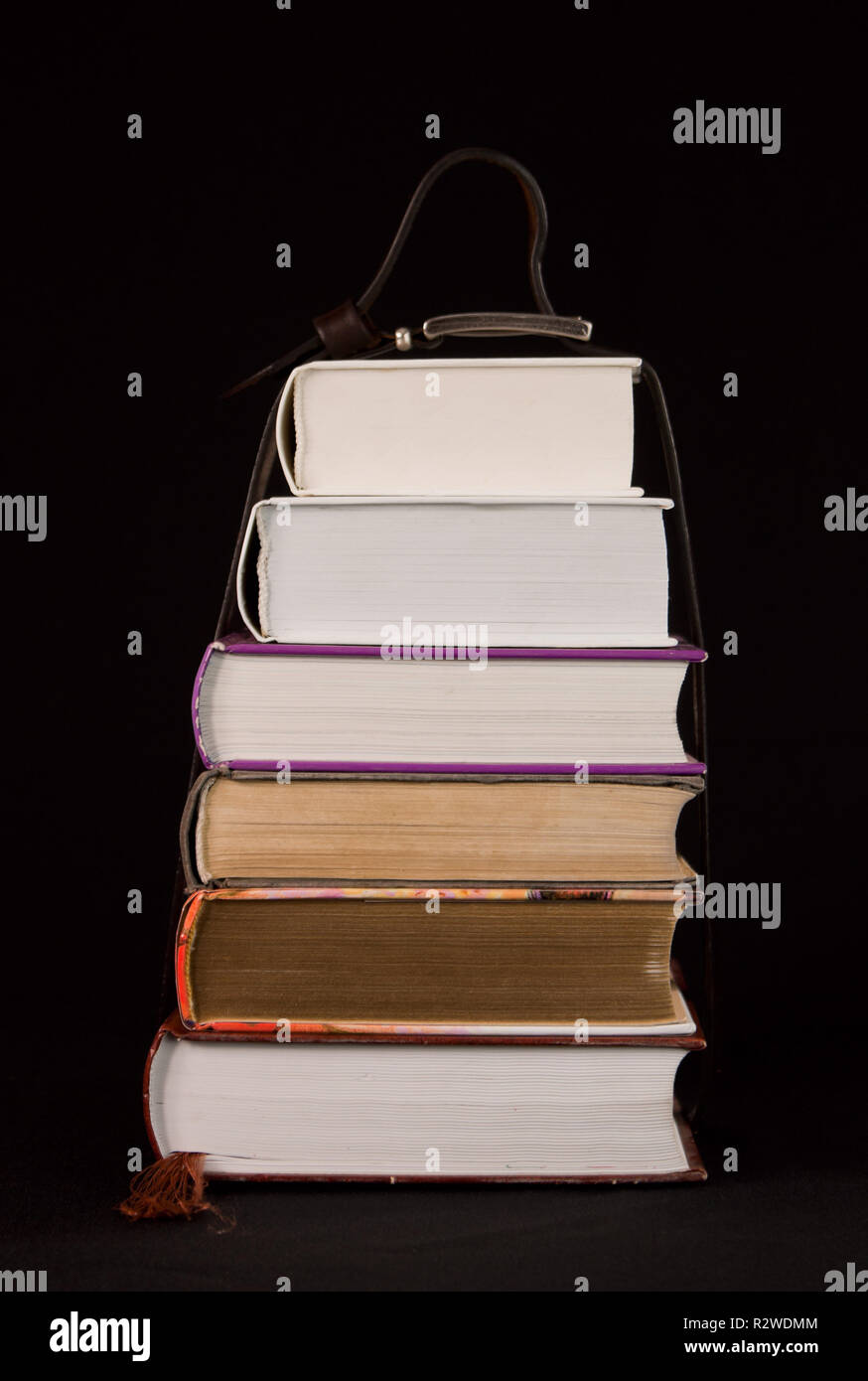 Books stack tall leather hi-res stock photography and images - Alamy