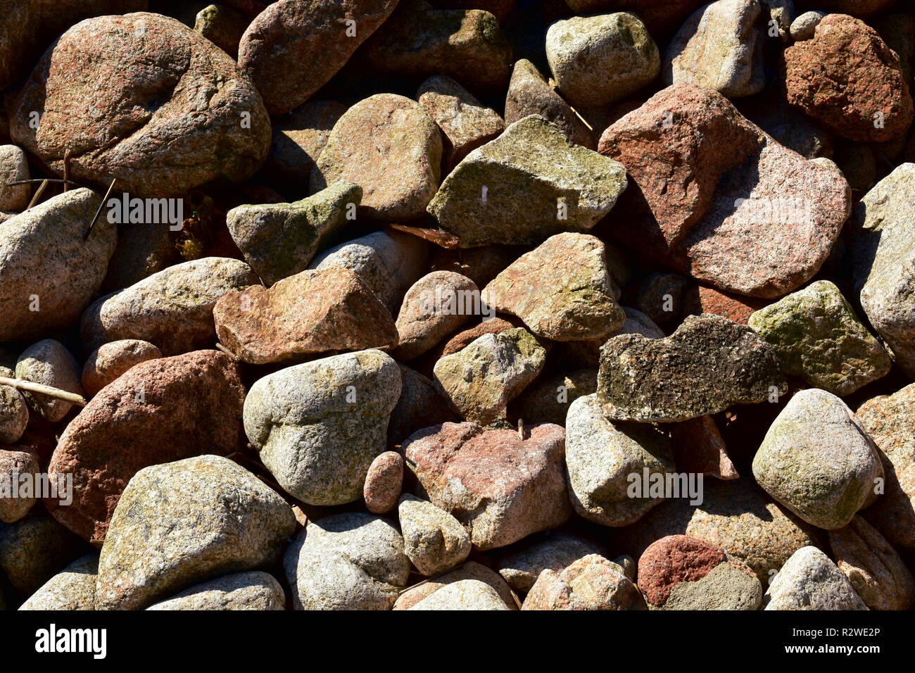 Rocks rough texture. Rugged rocks background with colours. Stones from ...